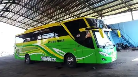 Info Lengkap Foto dan Harga Sewa Bus Pariwisata Putra Tidar - Saturental